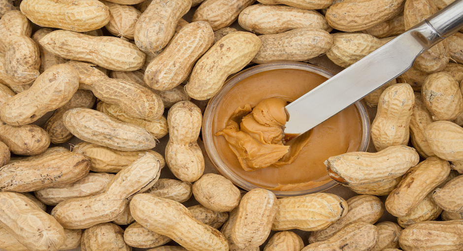 Peanut butter and raw peanuts in shells - The Alternative Daily
