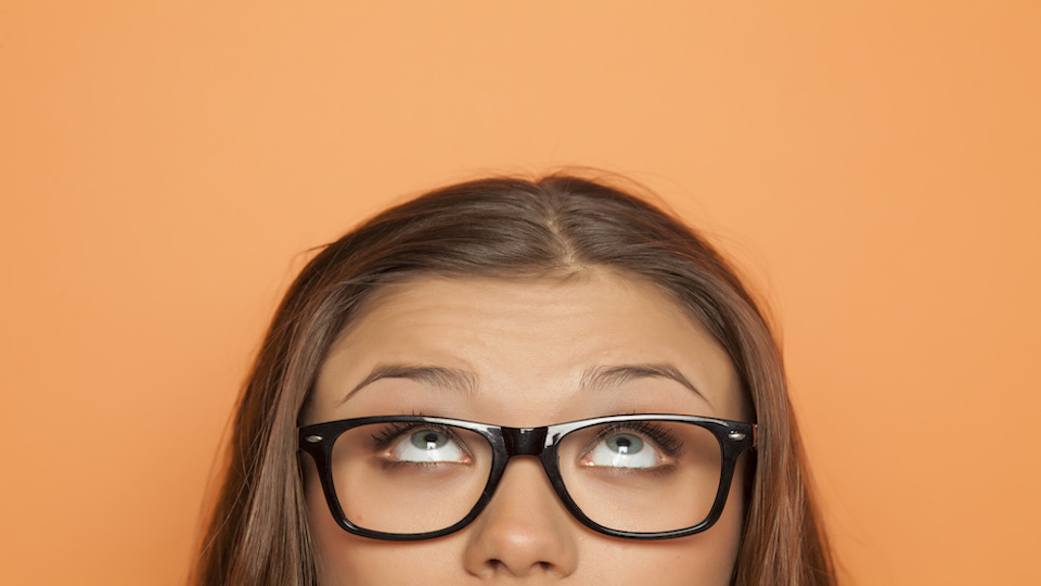 half portrait of a young girl with glasses looking up - The Alternative ...